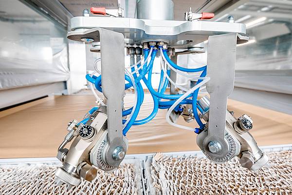 Robots de pintura y máquinas de pintura - Dürr